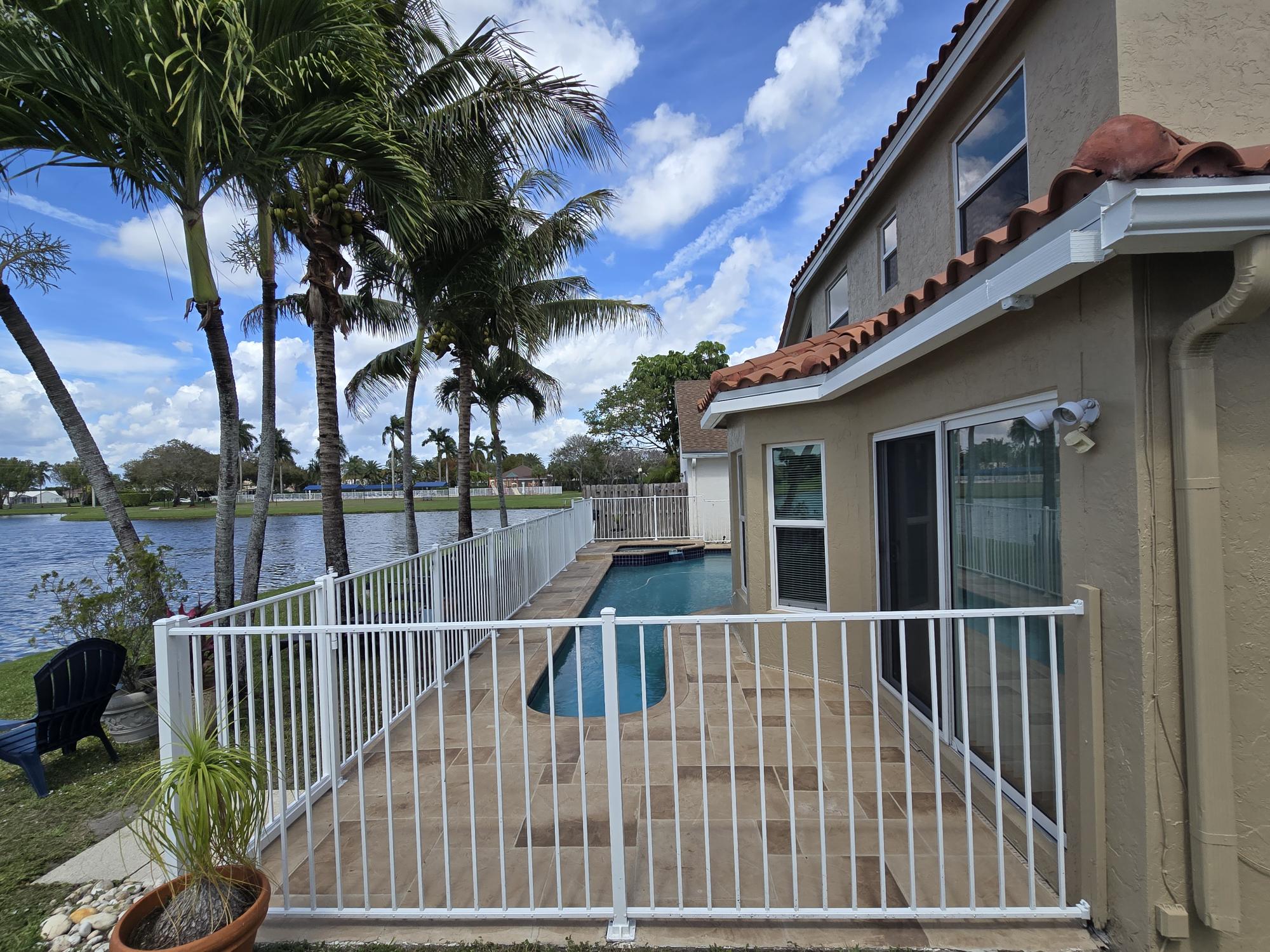 Painted Aluminum Railing Fence After - CertaPro Painters® of Boca Raton, FL